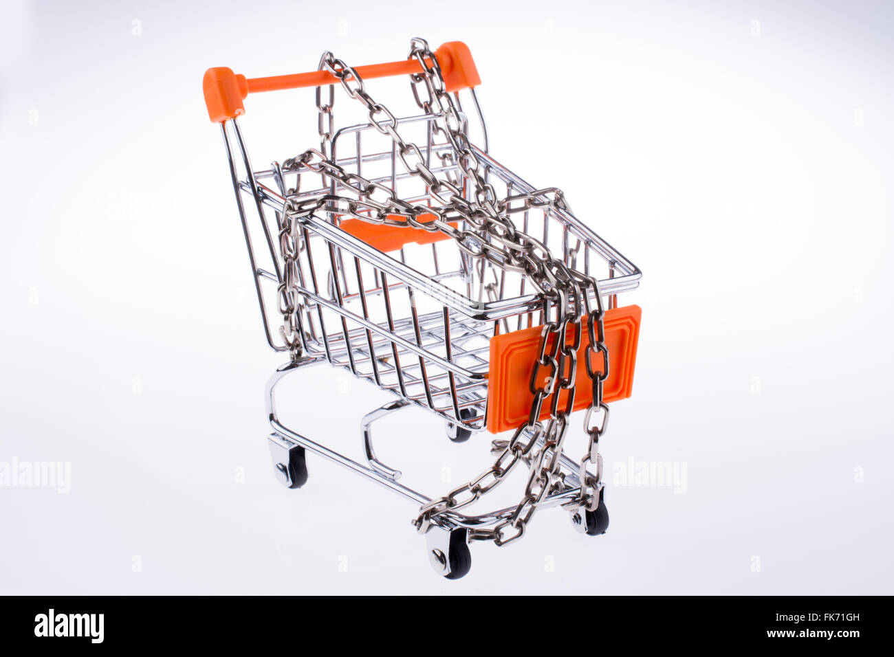 Chained shopping cart in white background Stock Photo - Alamy
