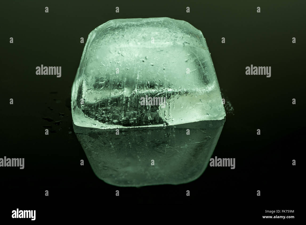 A closeup shot of ice against a black background Stock Photo - Alamy