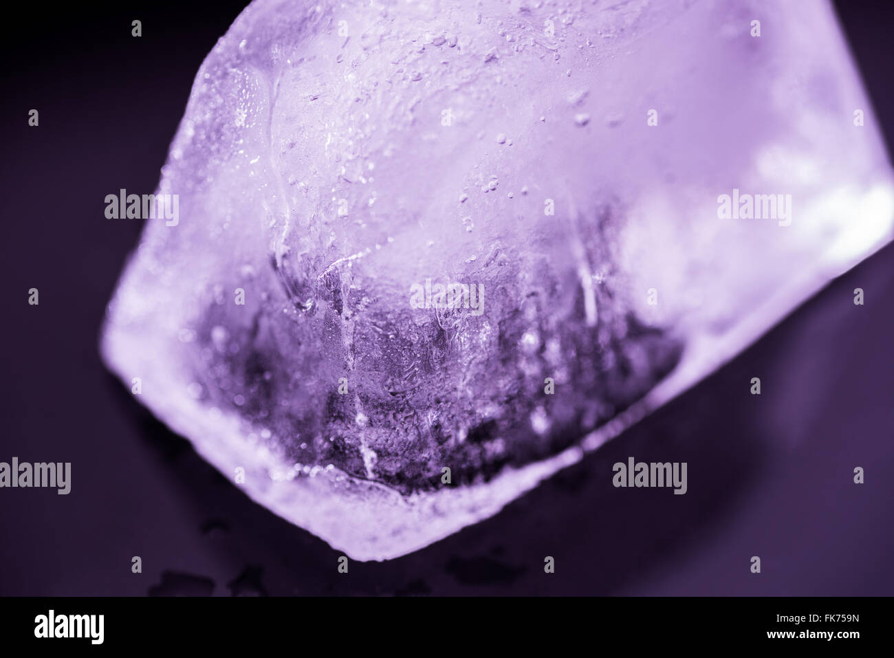 A closeup shot of ice against a black background Stock Photo - Alamy