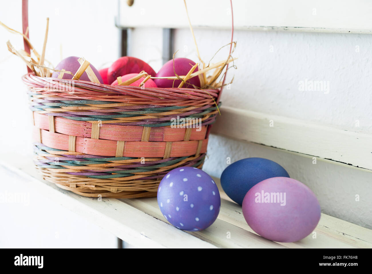 Easter eggs and basket Stock Photo - Alamy