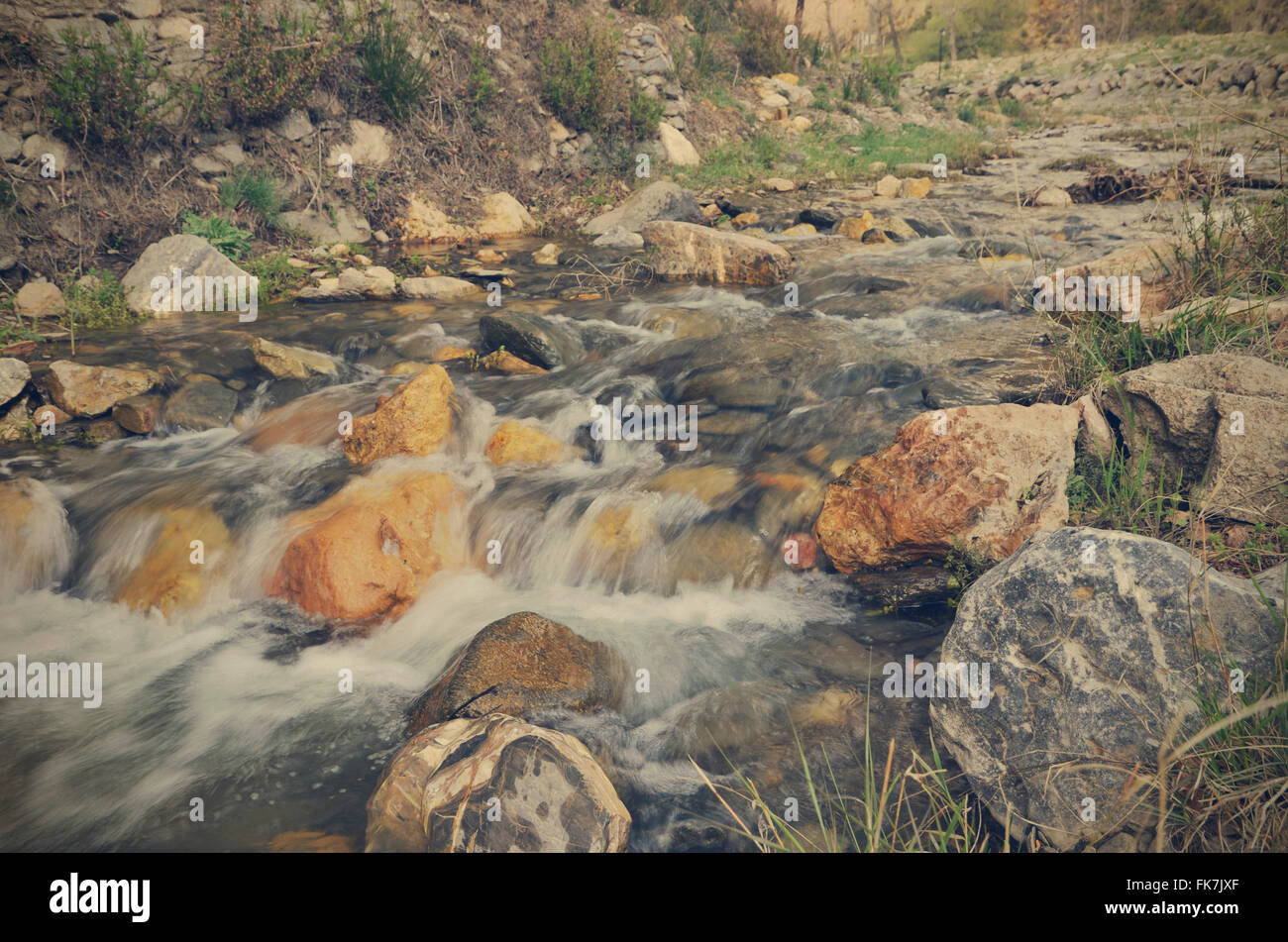 river down between rocks Stock Photo - Alamy