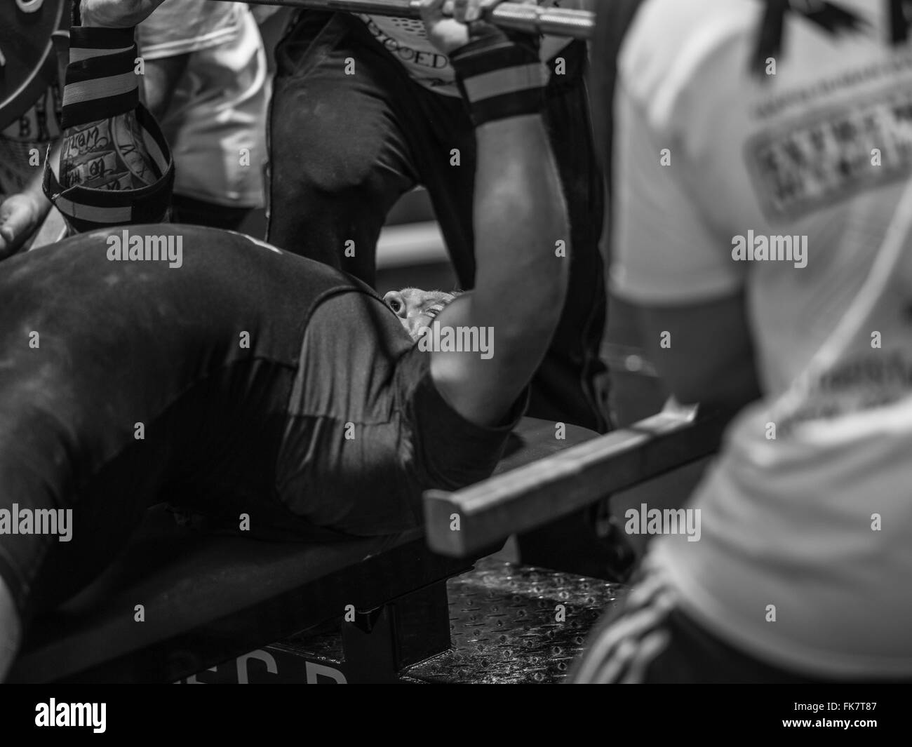 Documentary photography from a power lifting event featuring men ...