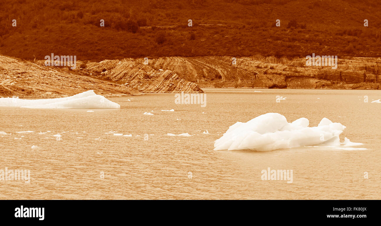 Patagonian landscape with icebergs in warm tone. Horizontal Stock Photo ...