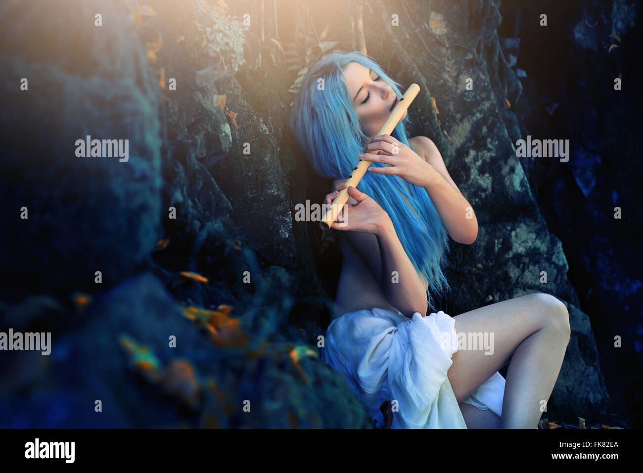 Young Woman Playing Flute High Resolution Stock Photography and Images ...