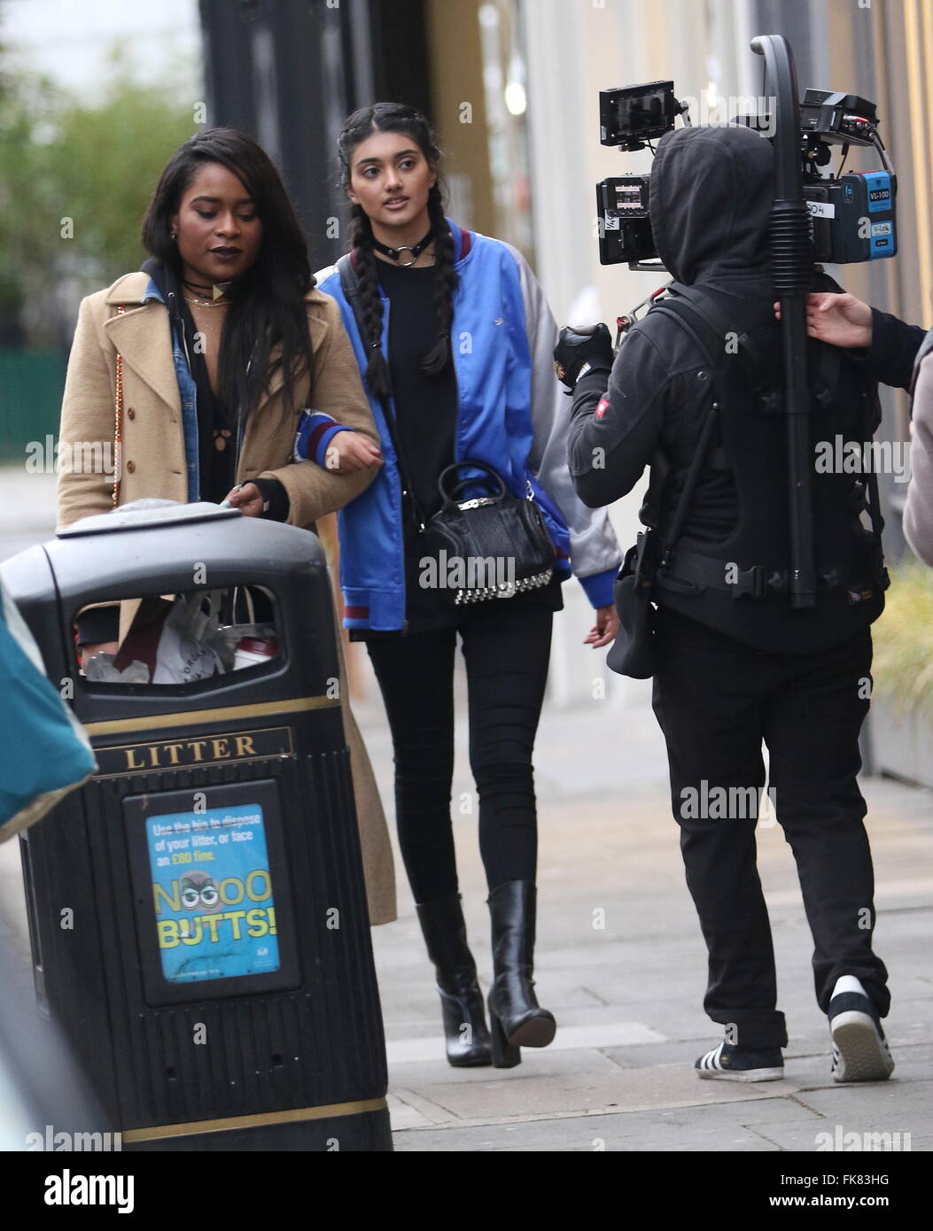 TV cameras follow British fashion model Neelam Gill, known for her work ...