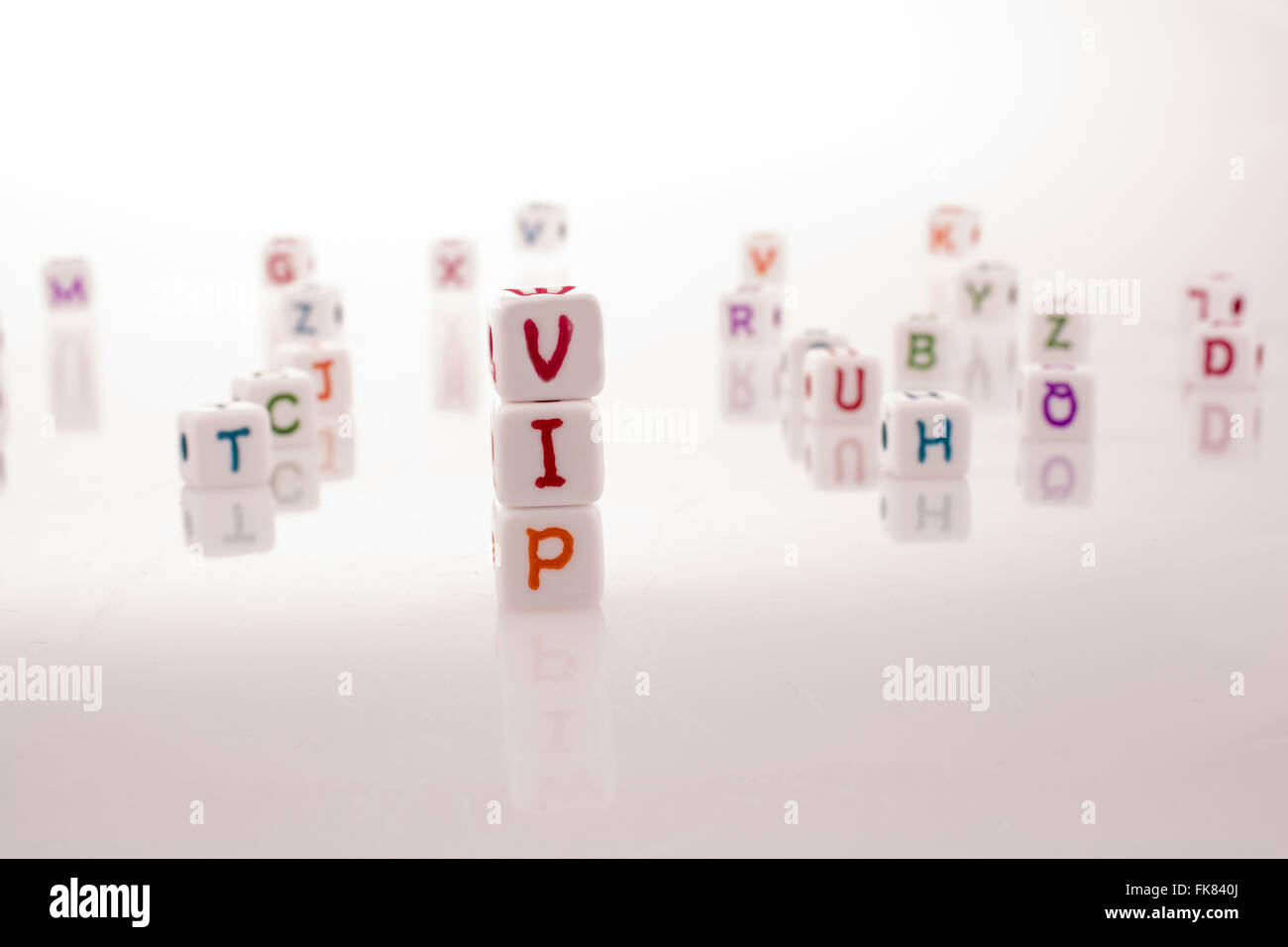 alphabet blocks and the word VIP on a white background Stock Photo - Alamy