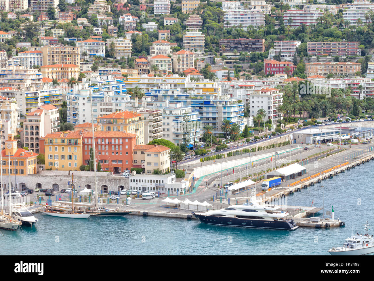 Cityscape of French Mediterranean sea port of Nice with super yachts ...