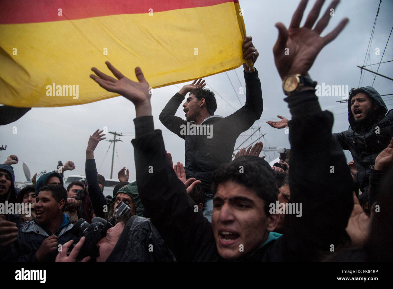 The German flag is shown in a manifestation at the refugee camp of ...