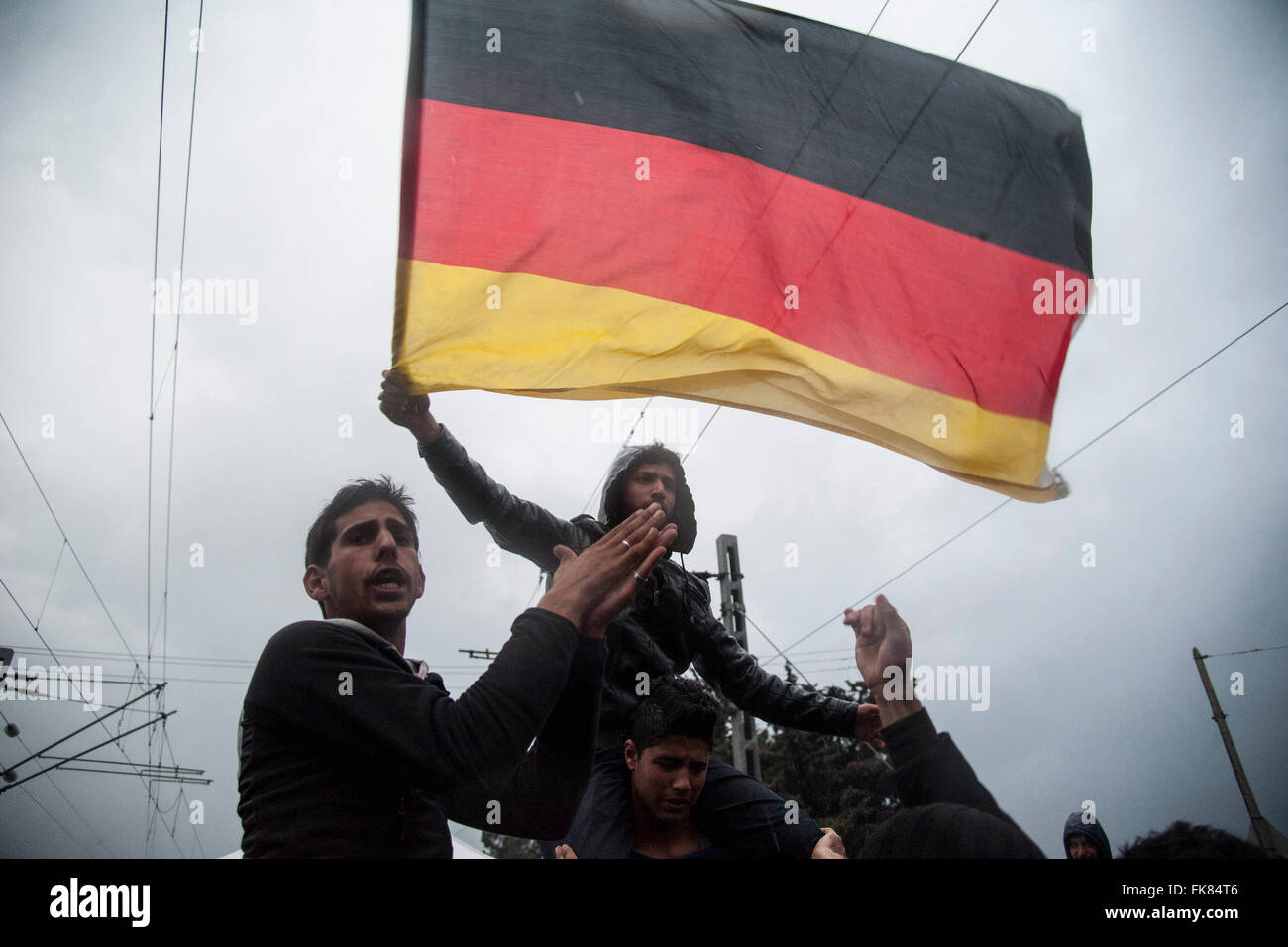 The German flag is shown in a manifestation at the refugee camp of ...