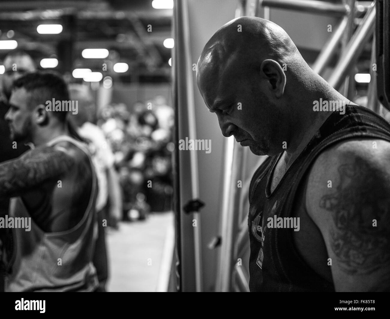 Documentary photography from a power lifting event featuring men ...
