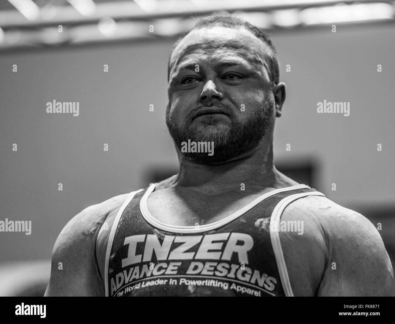 Documentary photography from a power lifting event featuring men ...