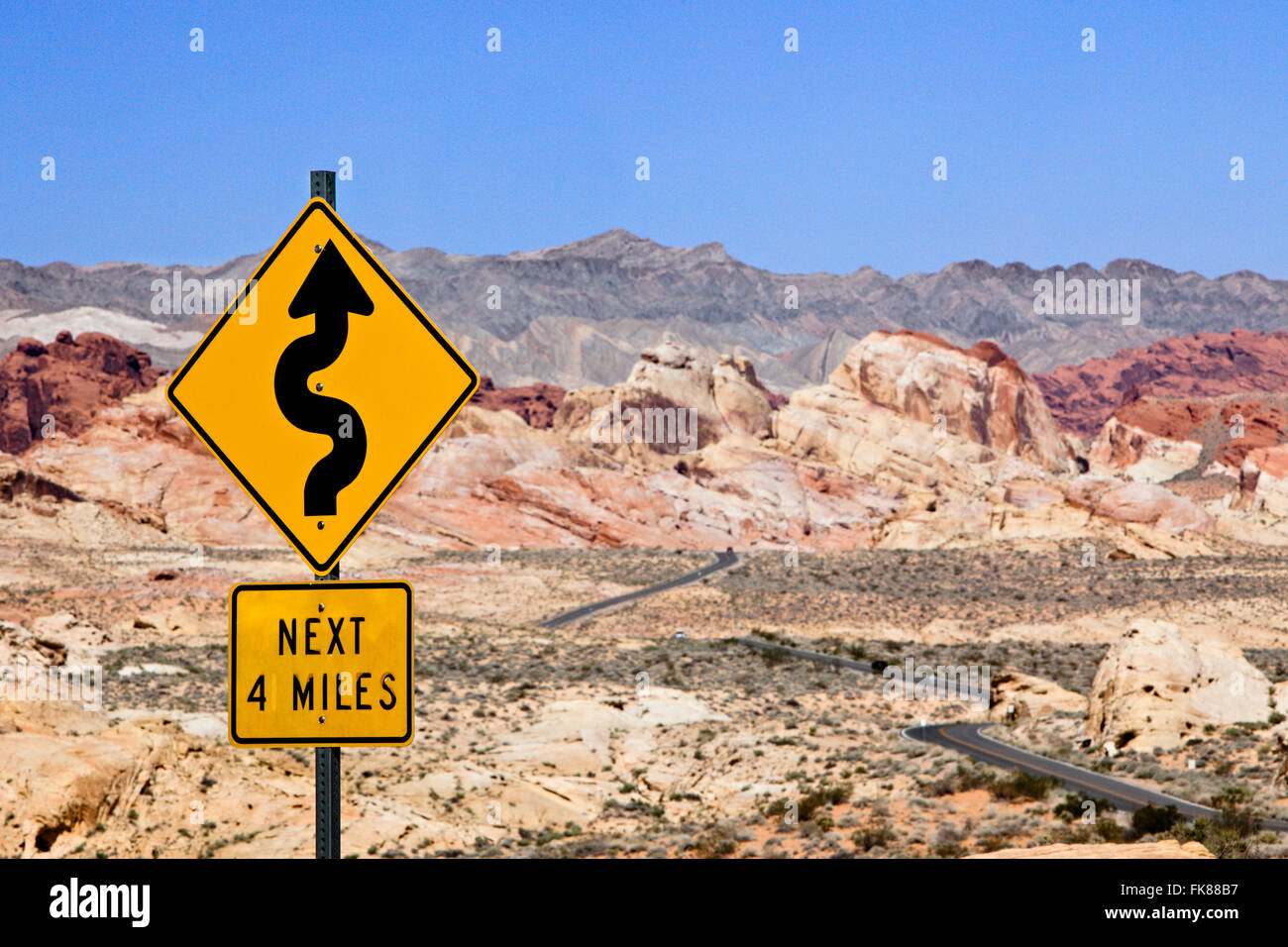 Winding road sign hi-res stock photography and images - Alamy