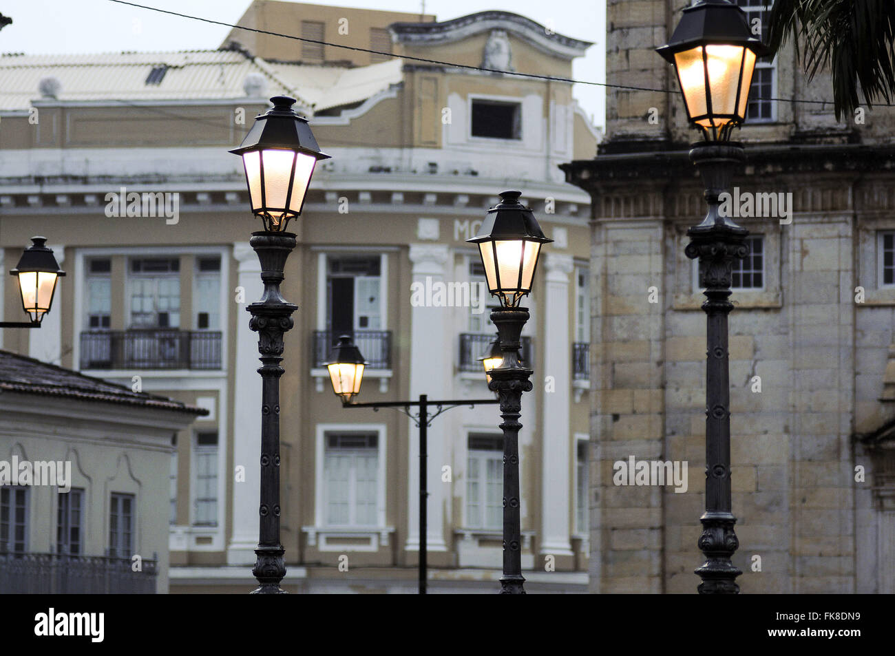 Colonial lamps lit in the historic center Stock Photo - Alamy