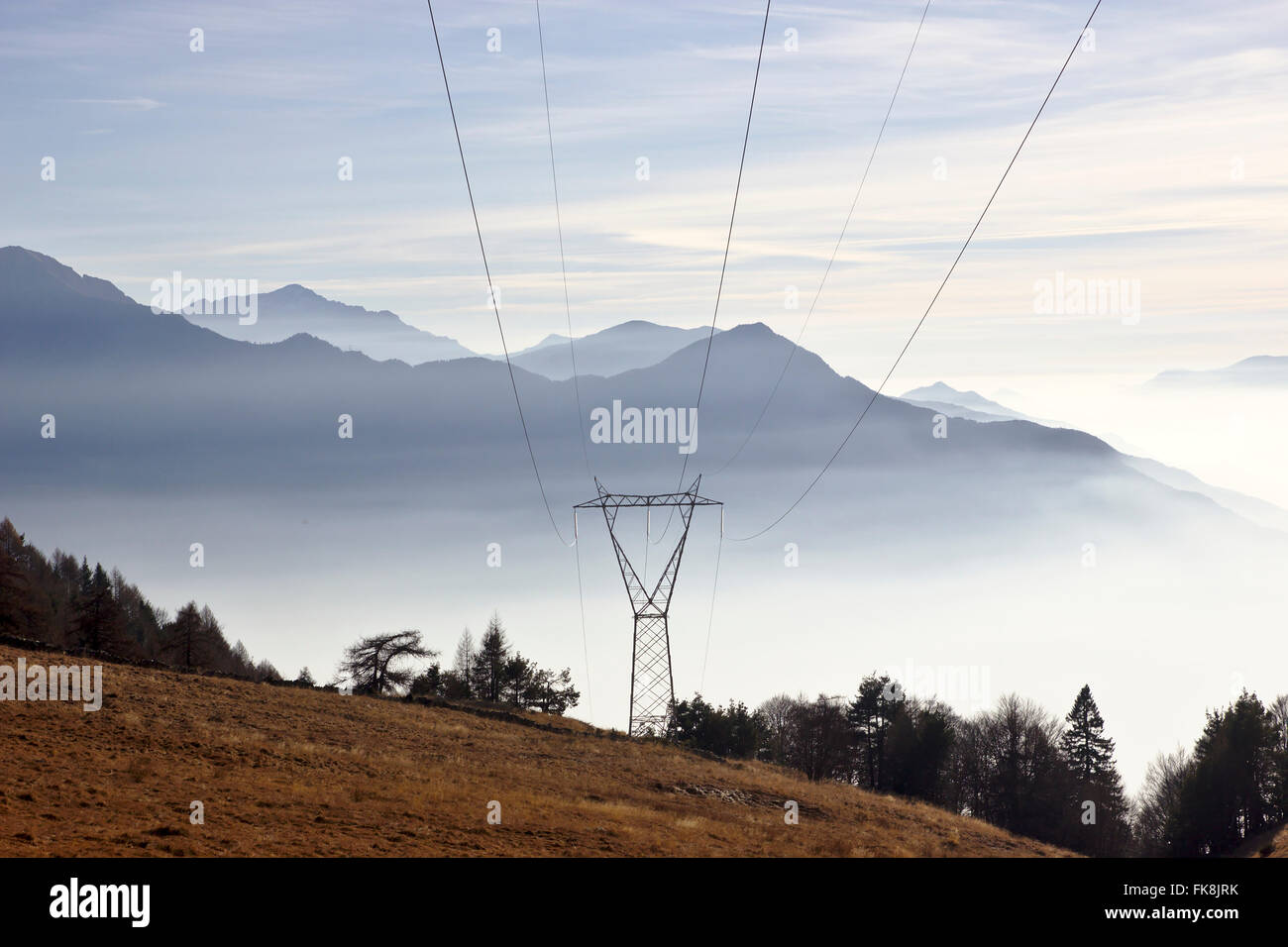 Power line in the alps, Alpe di Mezzo, Lario, Lombardy, Italy Stock ...