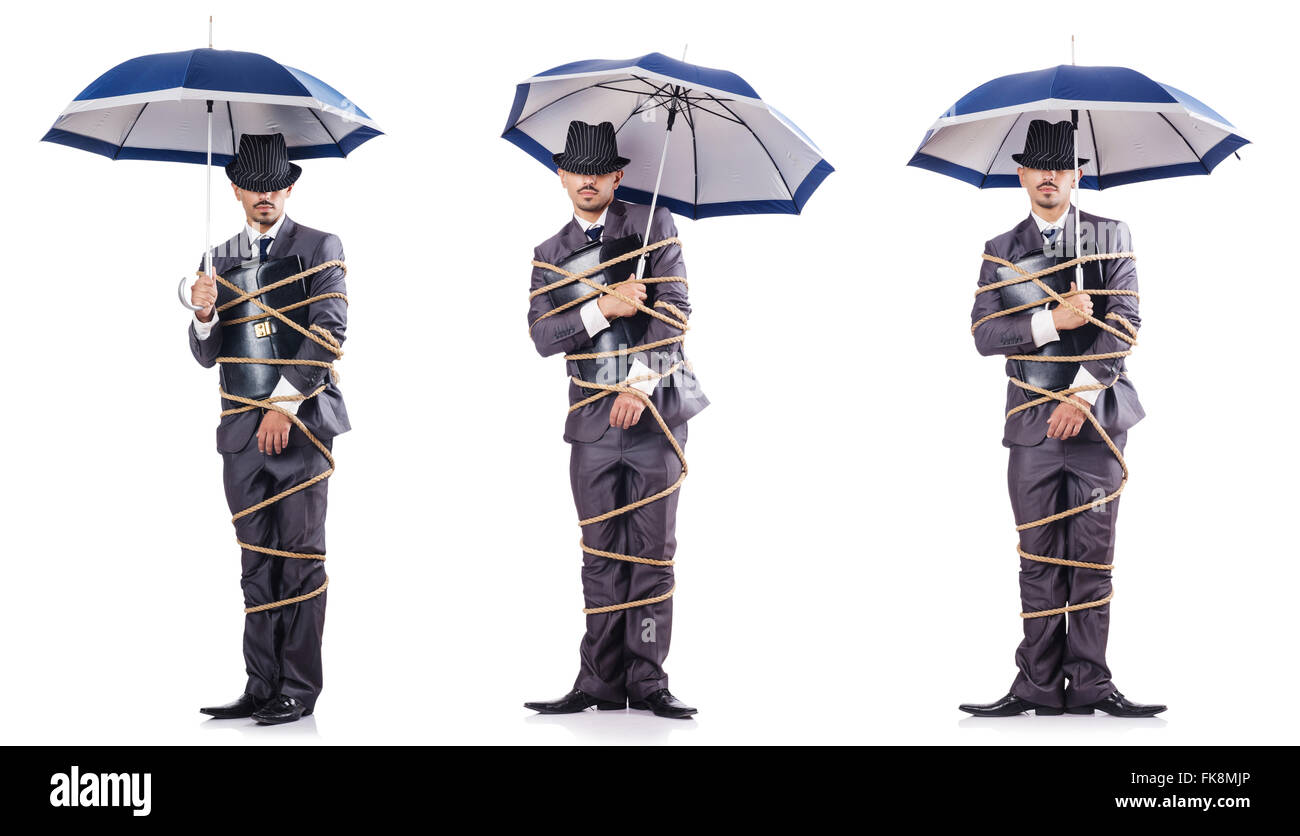 Businessman tied up with rope Stock Photo - Alamy