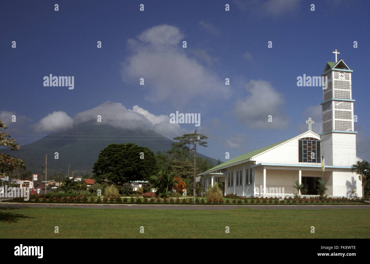 Church in La Fortuna with Volcan Arenal in distance, Guanacaste, Costa ...