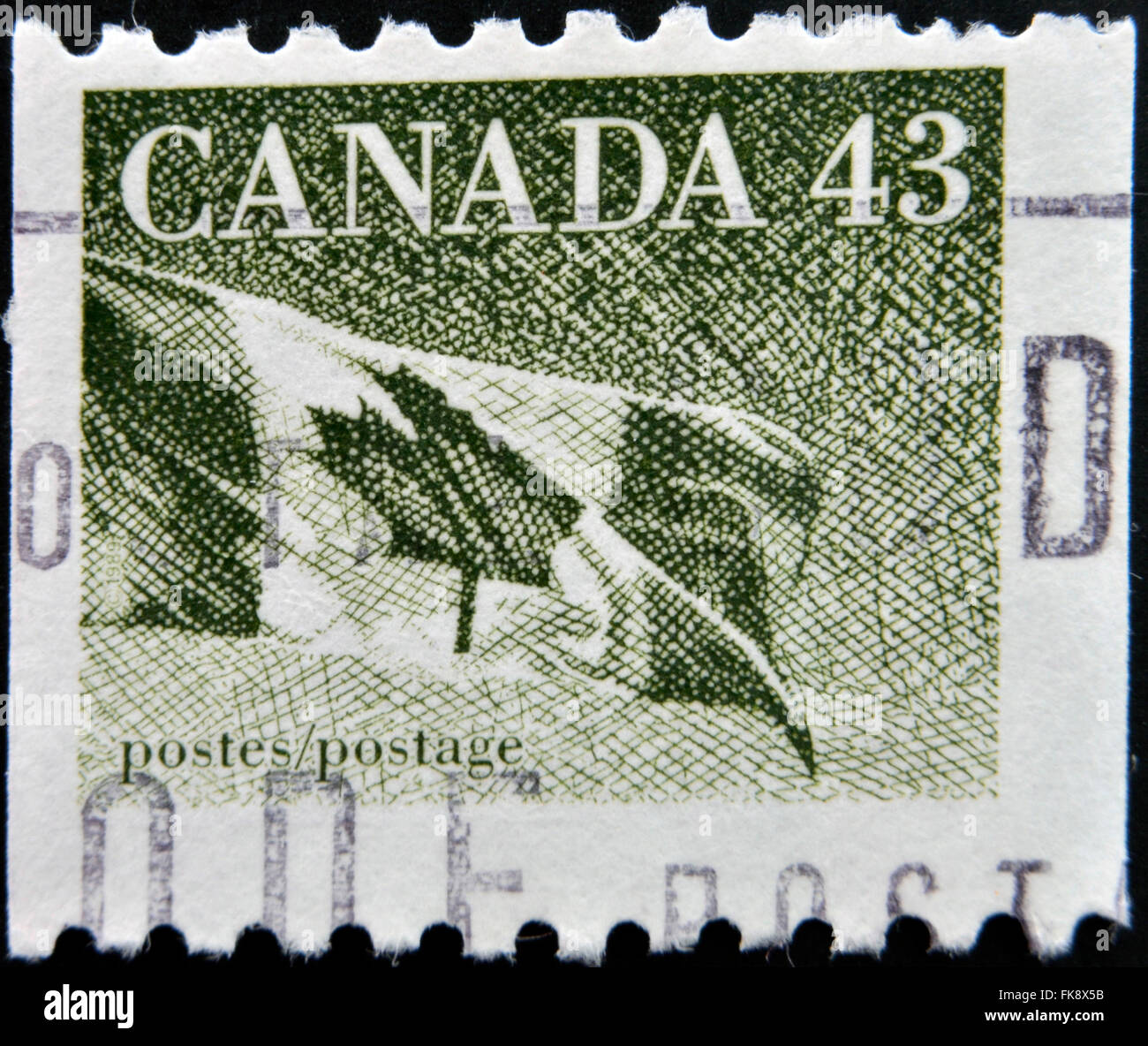 CANADA - CIRCA 1990: A stamp printed in Canada shows Canadian flag ...