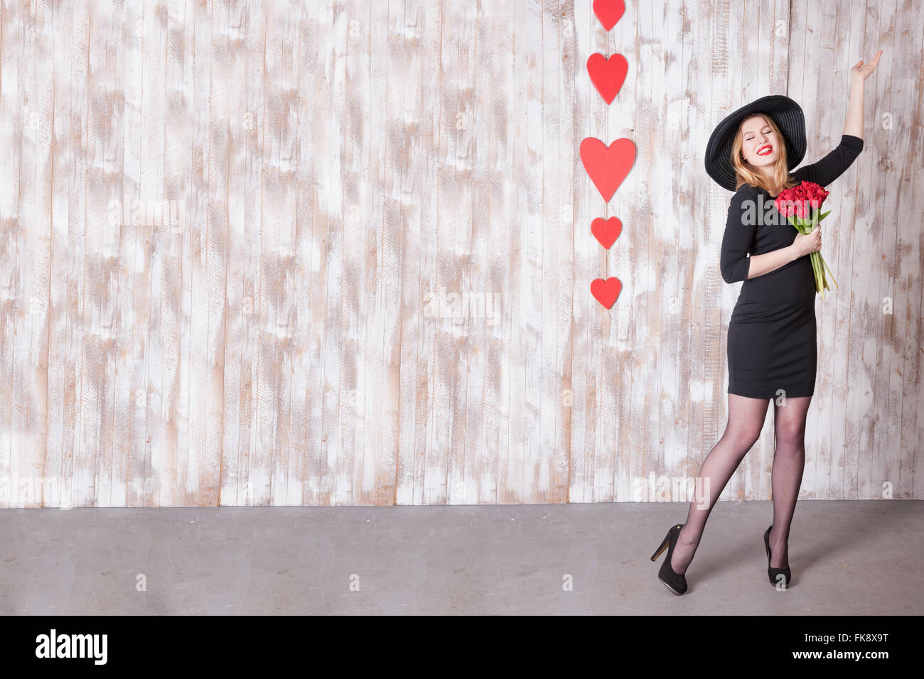 happy girl with red spring flowers, emotions, joy, love. horizontal ...
