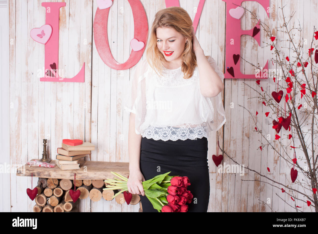 happy girl with red spring flowers, emotions, joy, love. horizontal ...
