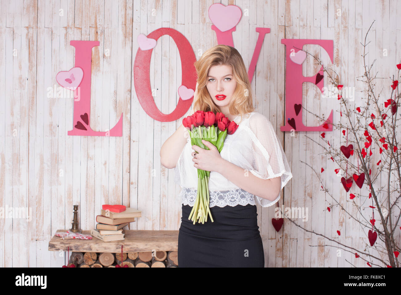 happy girl with red spring flowers, emotions, joy, love. horizontal ...