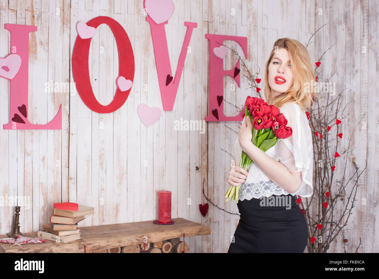 happy girl with red spring flowers, emotions, joy, love. horizontal ...