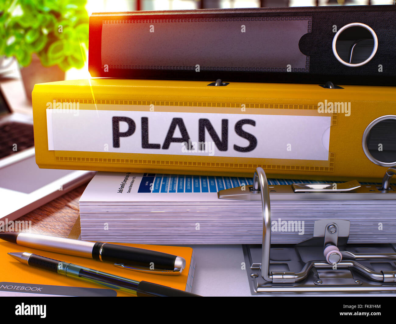 Plans on Yellow Office Folder. Toned Image Stock Photo - Alamy