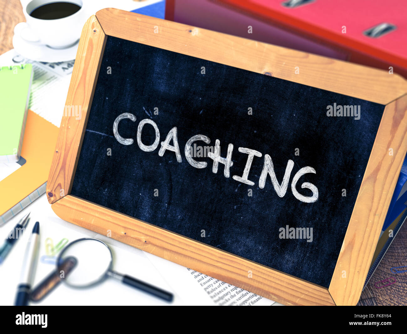 Hand Drawn Coaching Concept on Small Chalkboard Stock Photo - Alamy