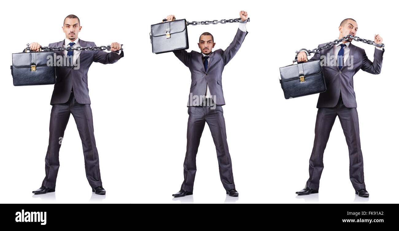 Businessman with shackles on white Stock Photo - Alamy