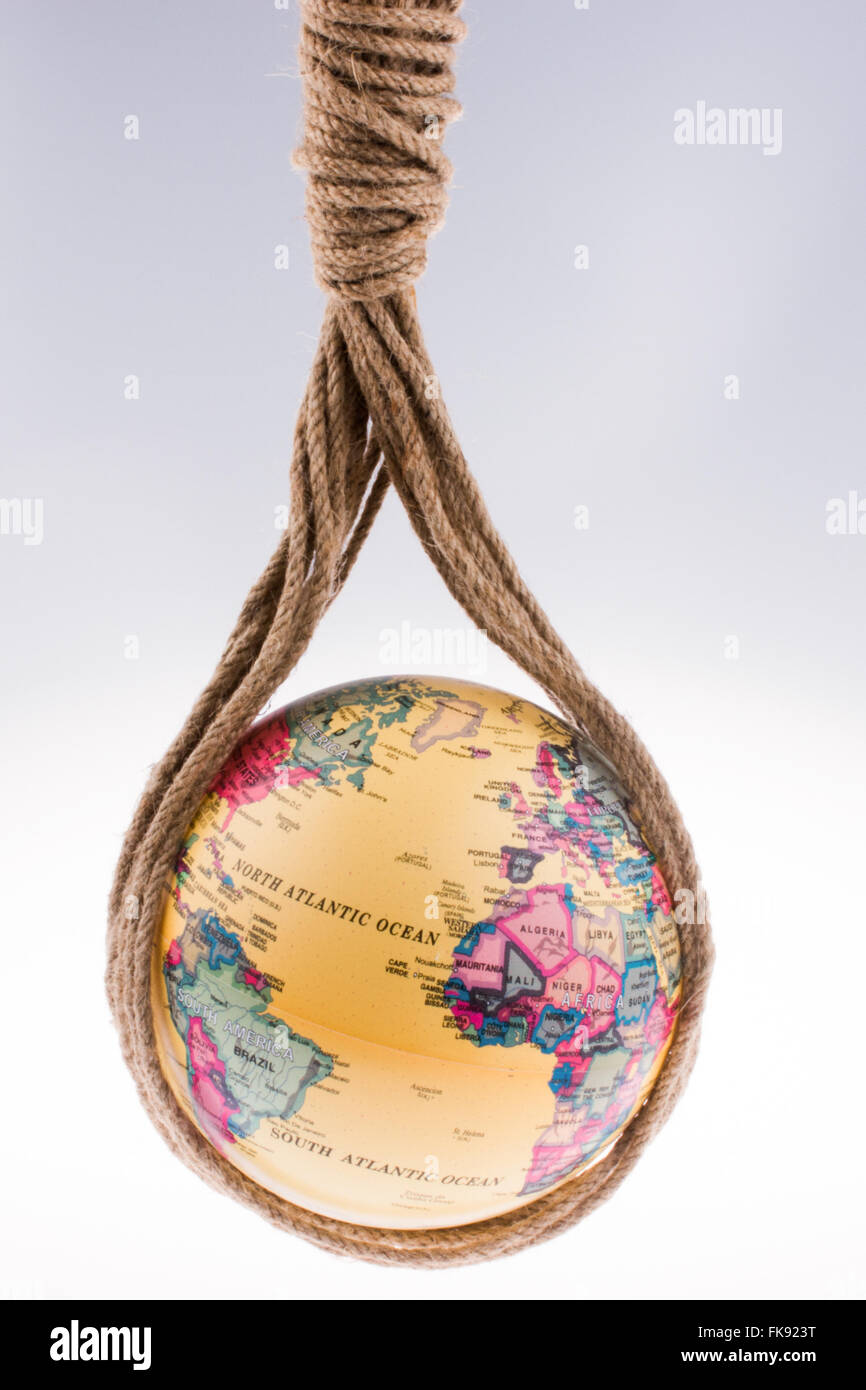 globe hanging in rope on white background Stock Photo - Alamy