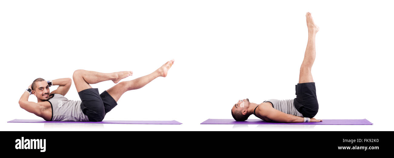 Man doing exercises on white Stock Photo - Alamy