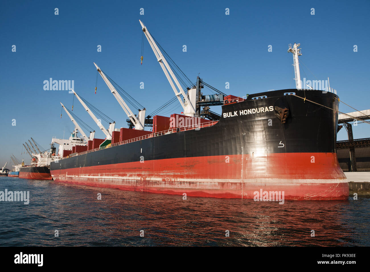 Merchant ship loaded with sugar docked at the Port of Santos Stock ...