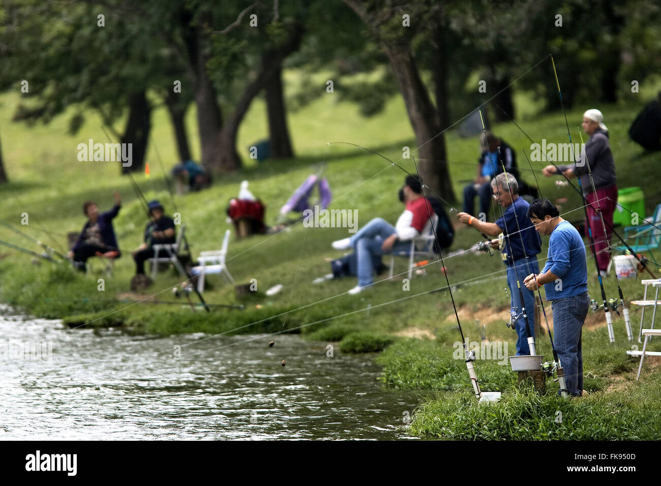 Fishing in rural city Stock Photo - Alamy