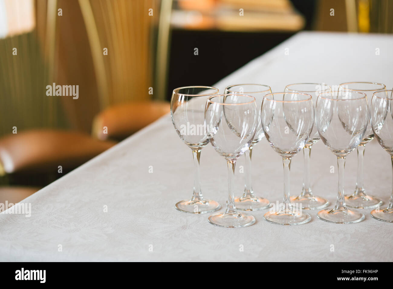 Empty glasses set in restaurant Stock Photo - Alamy