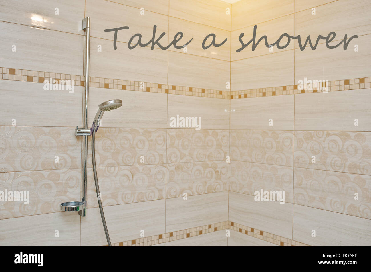 Shower in the bathroom with slogan take a shower Stock Photo - Alamy