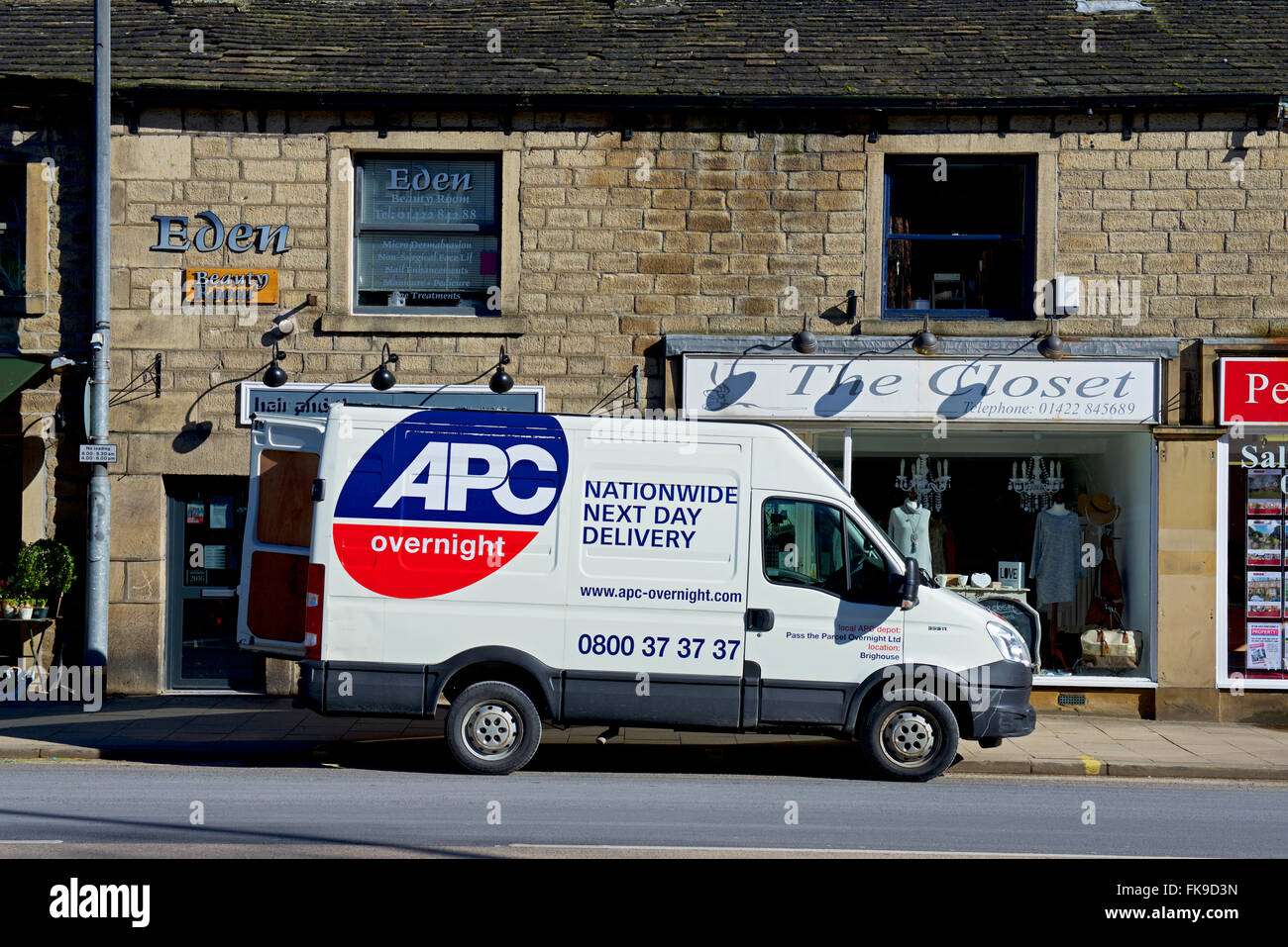 APC Nationwide delvery van parked outside shops, England UK Stock Photo ...