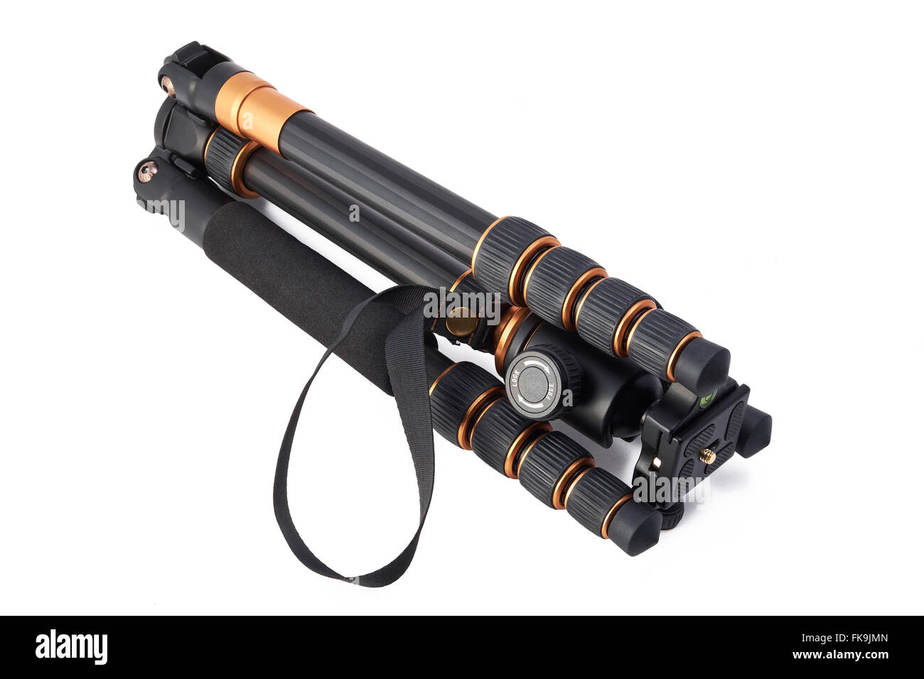 foldable travel tripod with twist lock system lying on white background ...