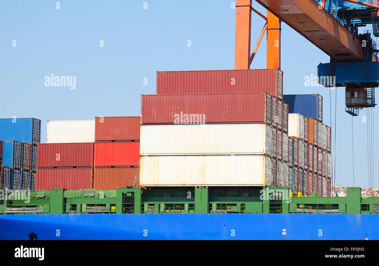 Container Ship is loading in a port Stock Photo - Alamy