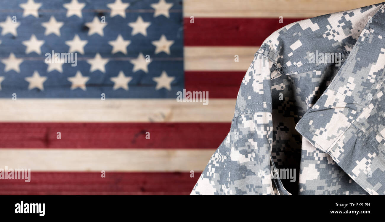 Close up of military uniform with painted rustic boards of USA flag in ...