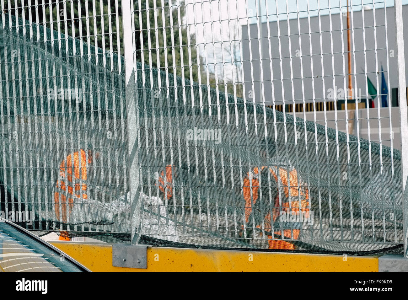Worker workers working the new Florence Italy surface train Stock Photo ...