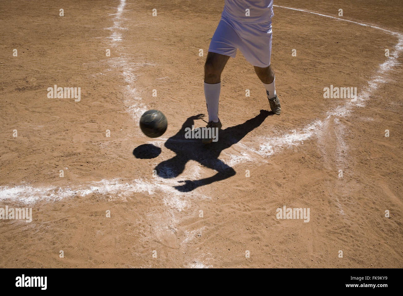 Amateur athlete playing ball on the field of land Stock Photo - Alamy