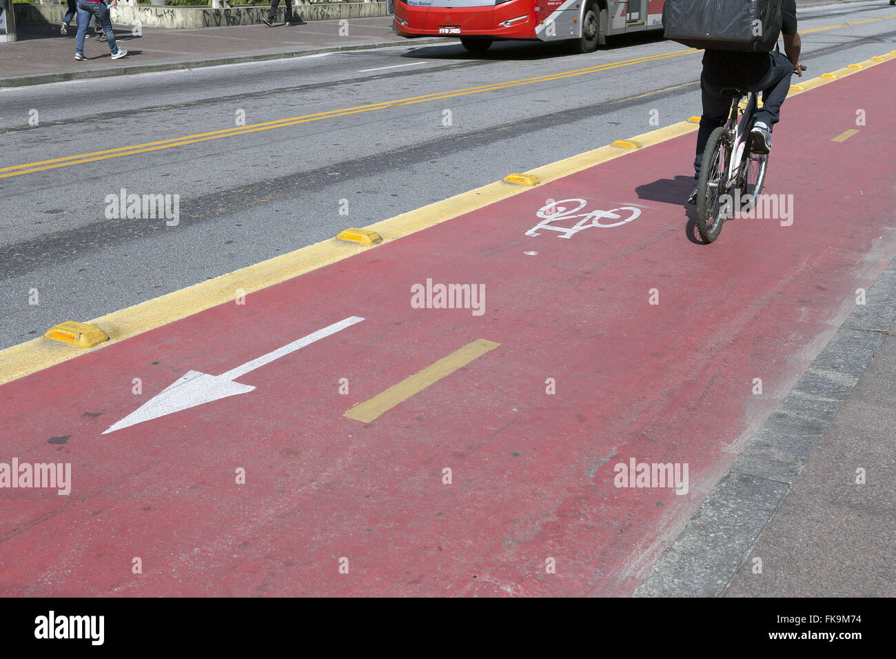 Riding in bike lane downtown hi-res stock photography and images - Alamy