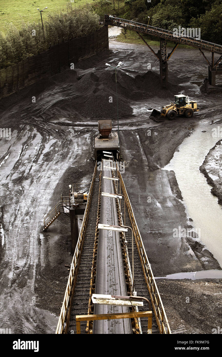 Conveyor for coal and coal pa loader moving the patio Stock Photo - Alamy