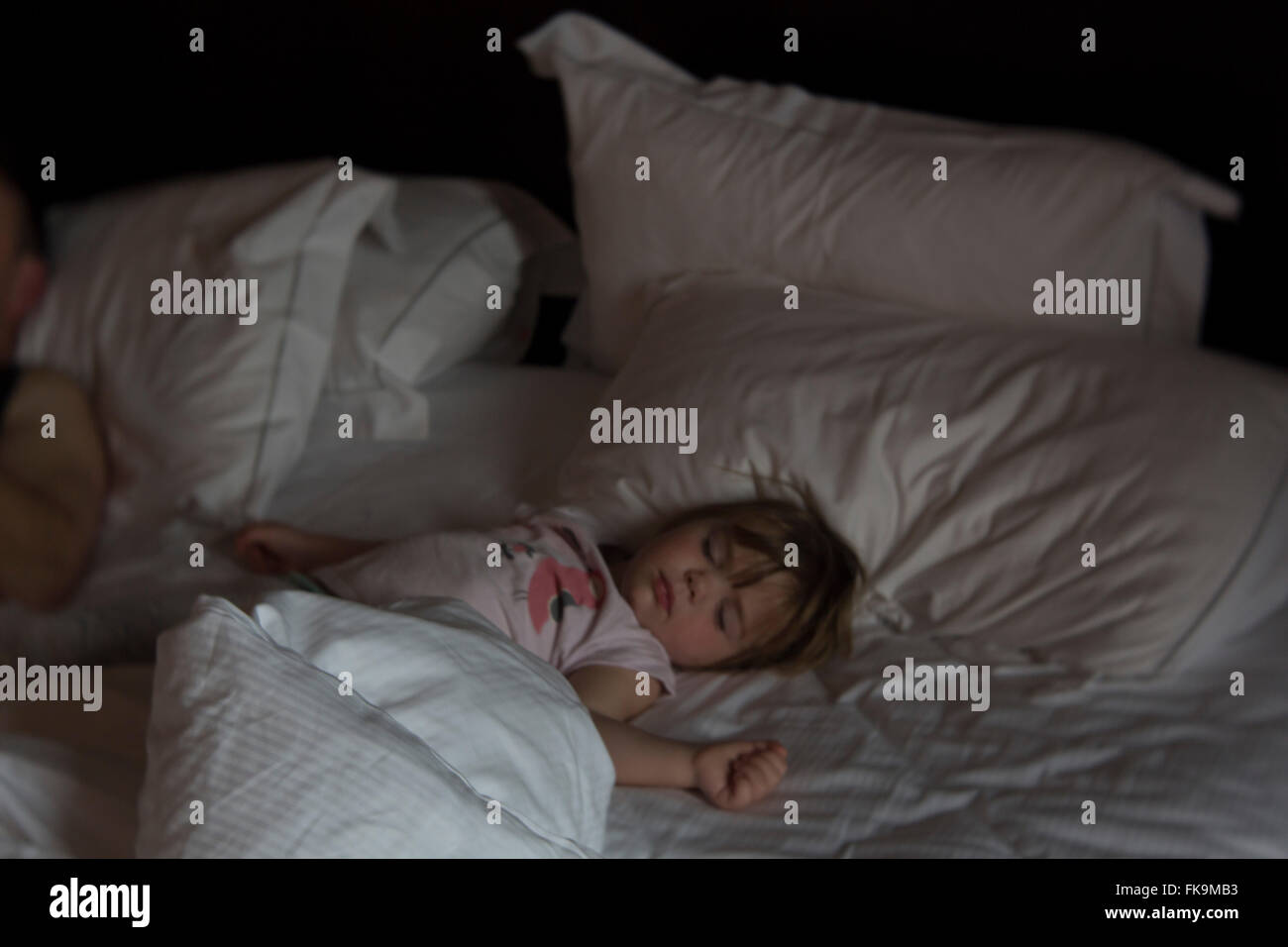 Girl in bed, not feeling well Stock Photo - Alamy