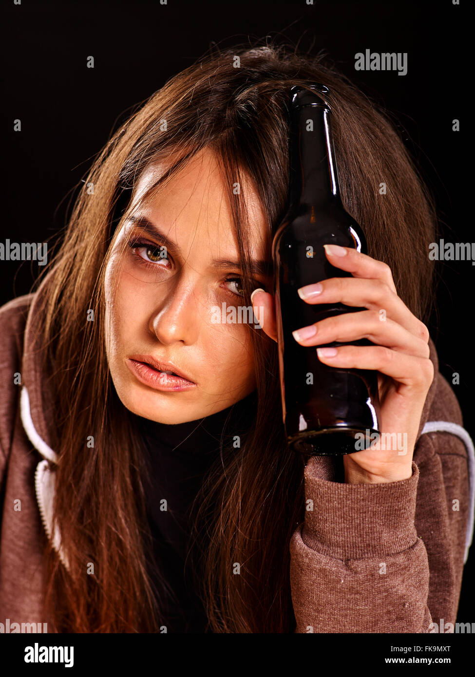 Drunk girl holding bottle vodka hi-res stock photography and images - Alamy