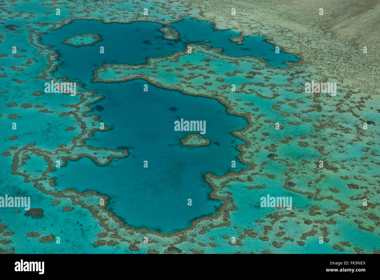 Aerial view of Hardy Reef, home to the heart reef, in the Great Barrier ...