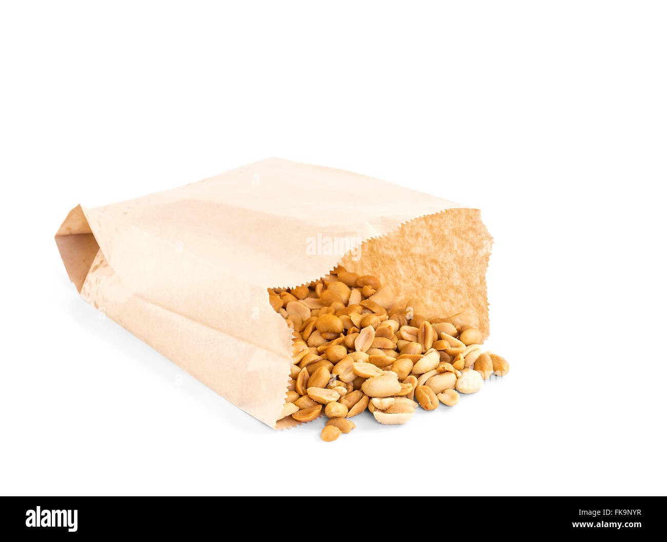 Processed peanuts in paper bag over white background with copy-space ...