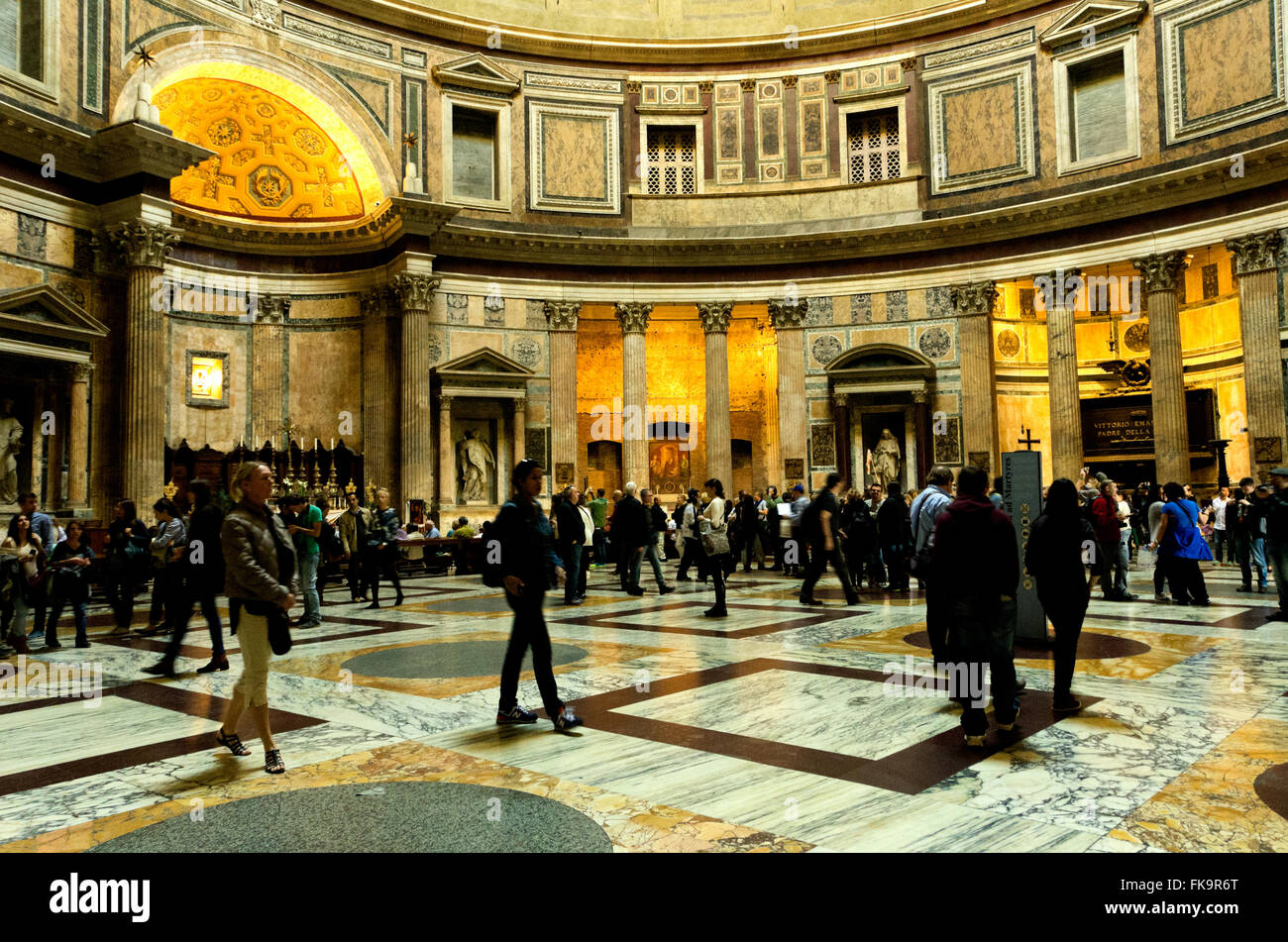 Large crowd mills in the Pantheon looking at statues and floor Stock ...