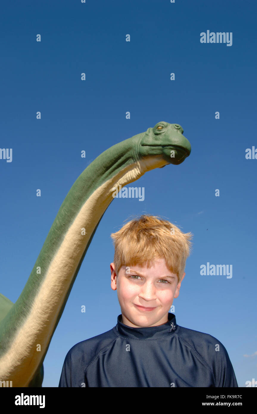 Young Boy and Dinosaur Stock Photo - Alamy