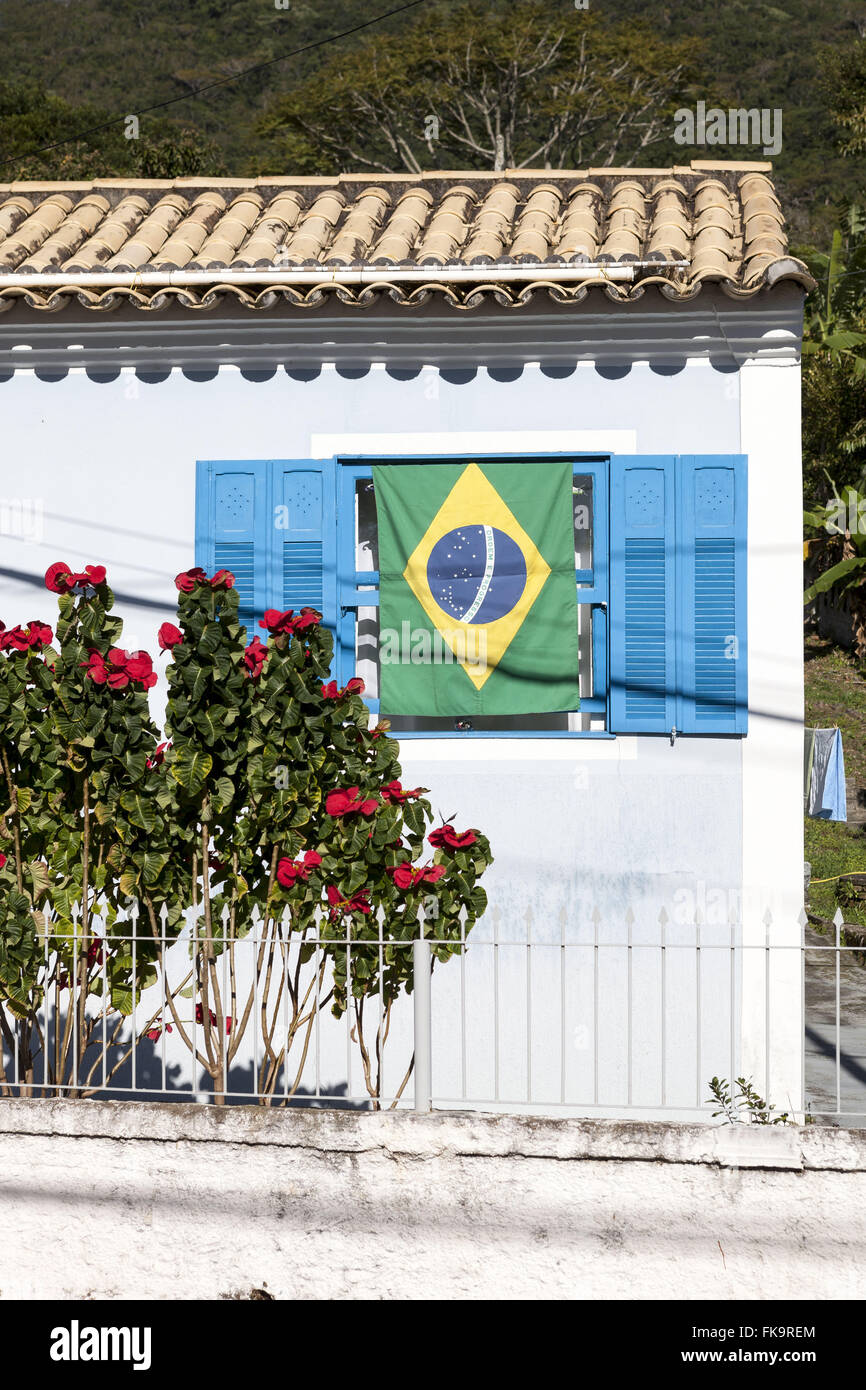 House window detail with the Brazilian flag during the World Cup Stock ...