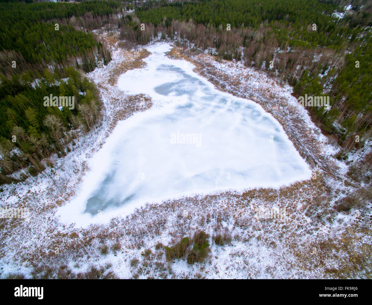Small frozen lake from above Stock Photo - Alamy